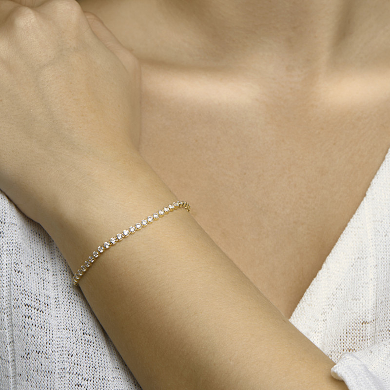 Gold plated tennisarmband 3 mm met zirkonia's | Mostert Juweliers